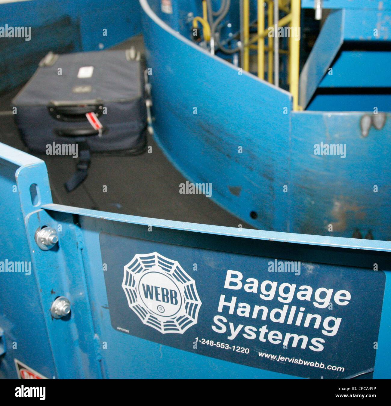 A suitcase enters the Transportation Security Administration automated ...