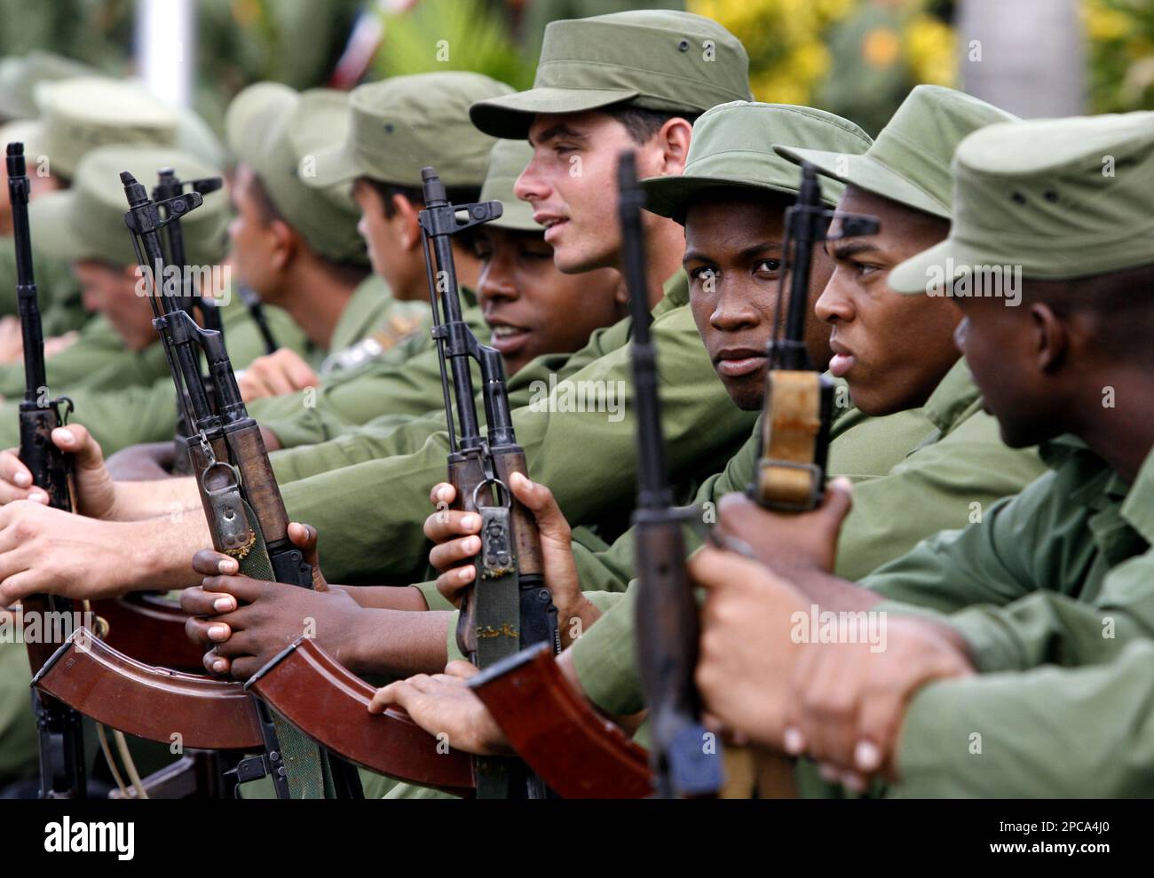 Cuban soldiers take a break along the Revolution Square during the ...