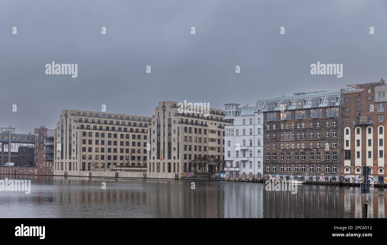 Prominent buildings on riverbanks of Spree river in Berlin Stock Photo ...