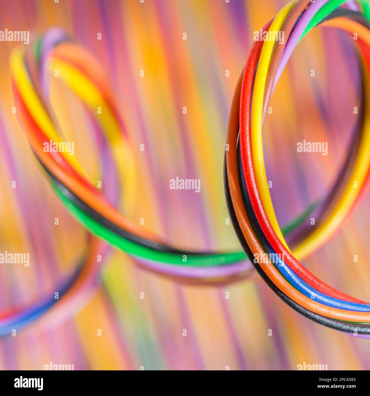 Close-up shot of multi-colored narrow gauge electrical wires. For ...