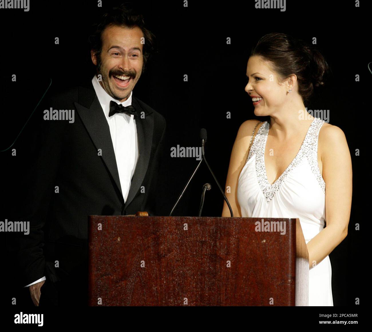 Actor Jason Lee, left, and actress Christa Campbell present the male ...