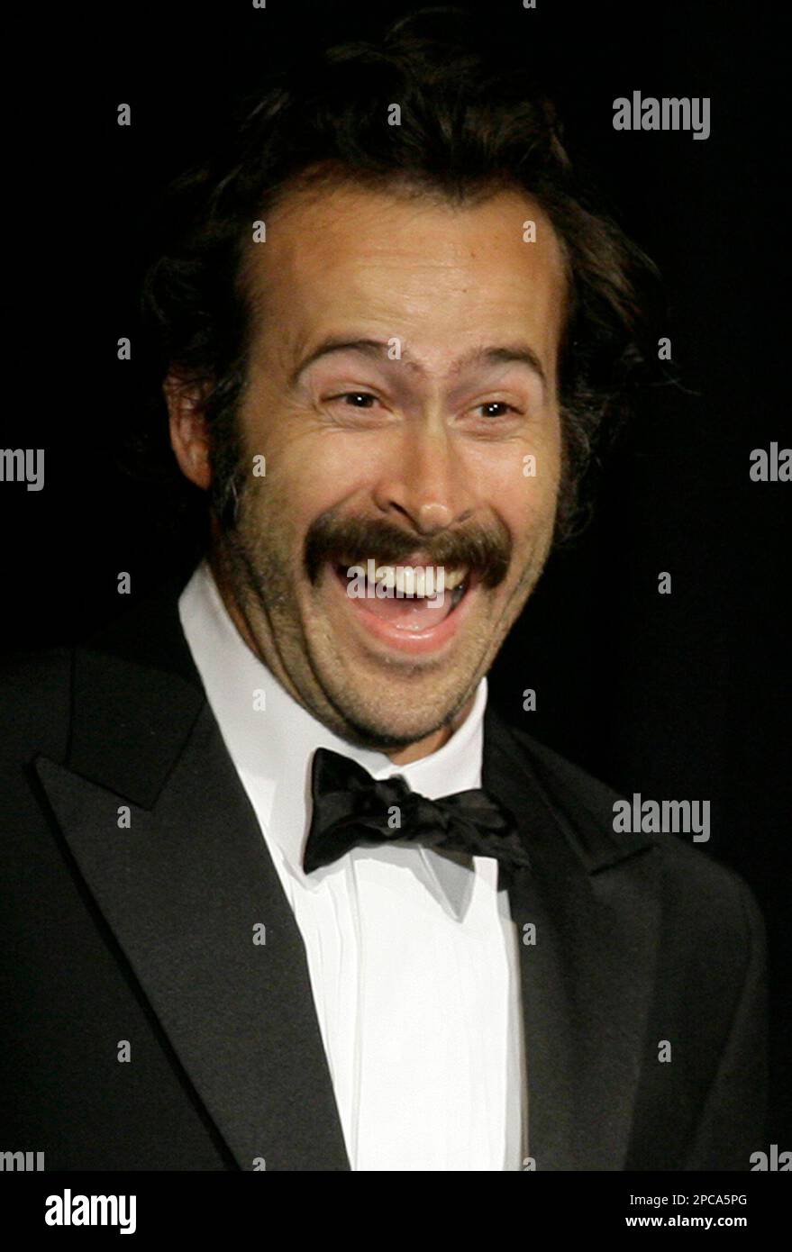 Actor Jason Lee presents the male "Nova" award to Michael Pena during ...