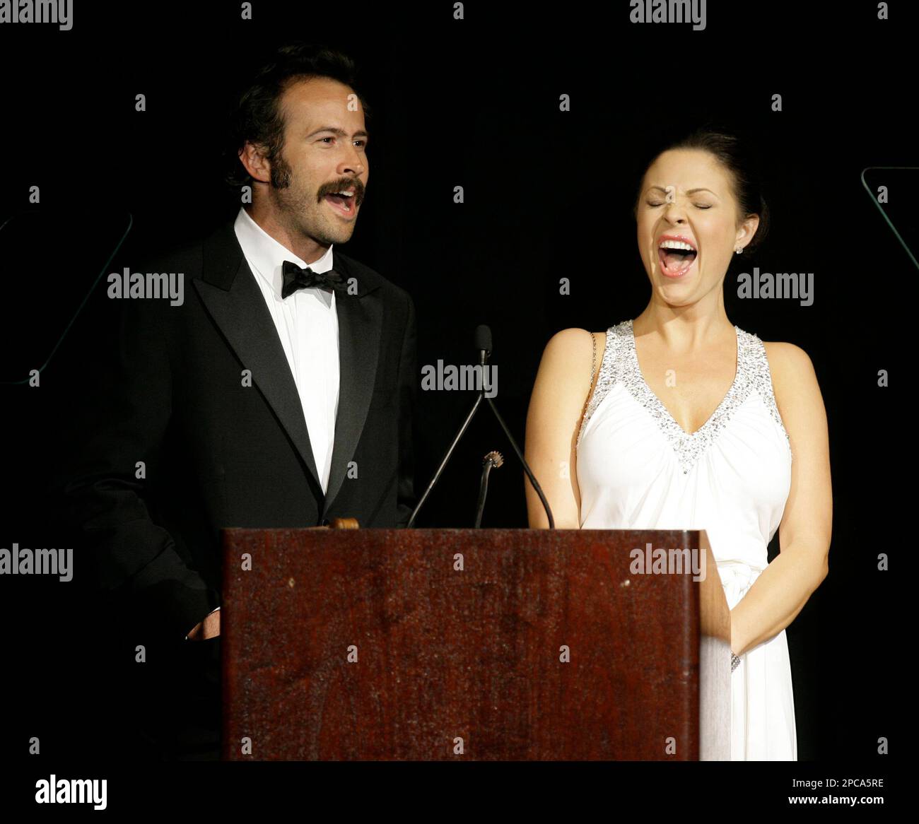 Actor Jason Lee, left, and actress Christa Campbell present the male ...