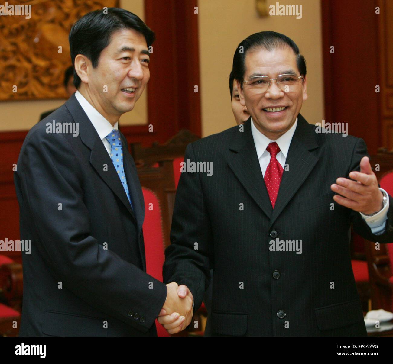 Vietnamese Communist Party General chief Nong Duc Manh, right, greets ...