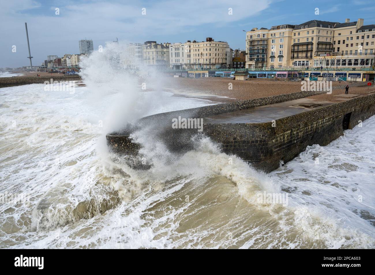 Brighton, UK. 13th Mar, 2023. High winds cause huge waves to crash on ...