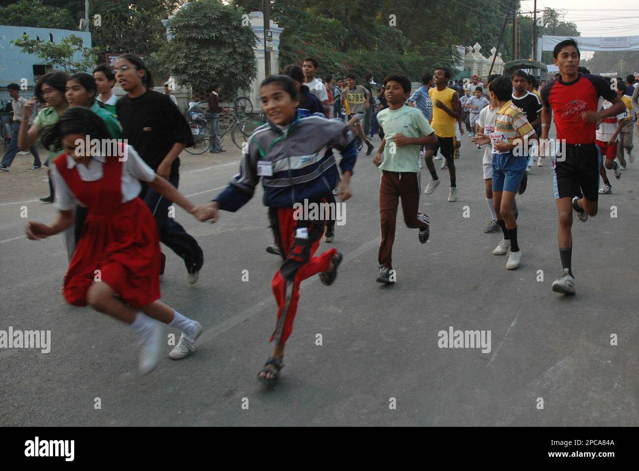 Children run in the Indira marathon, organized to commemorate the birth ...