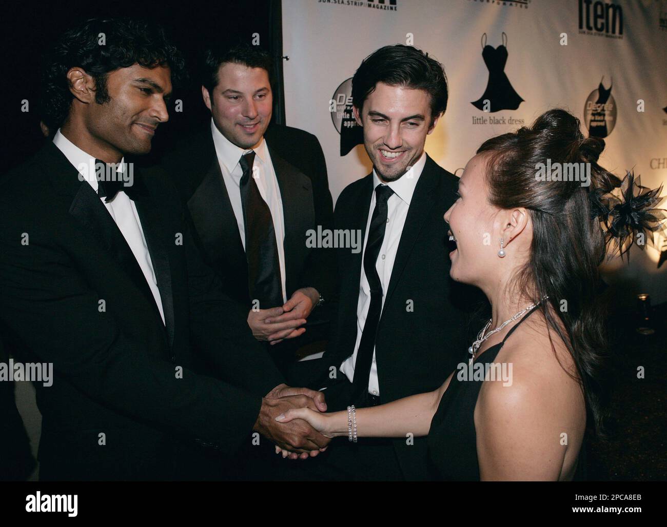 (L-R) Actors Sendhil Ramamurthy, Greg Grunberg, and Milo Ventimiglia greet the founder of the ...