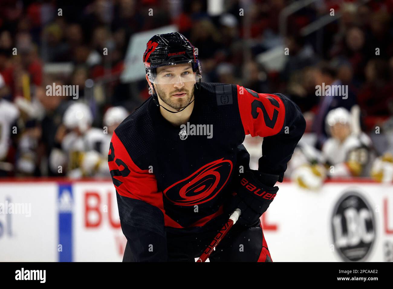 Carolina Hurricanes' Brett Pesce (22) watches the puck against the ...