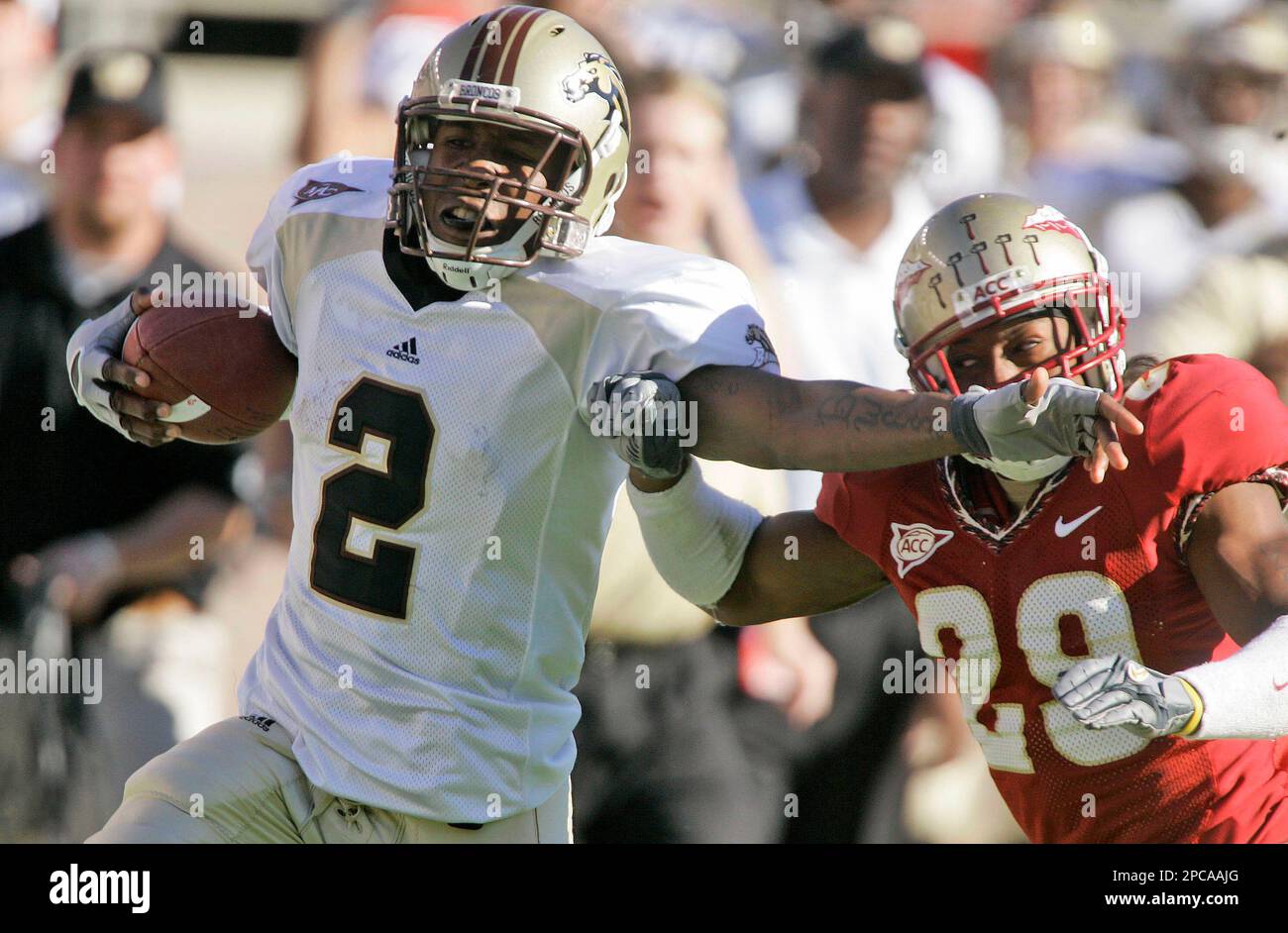 Western Michigan running back Brandon West, left, runs for second ...