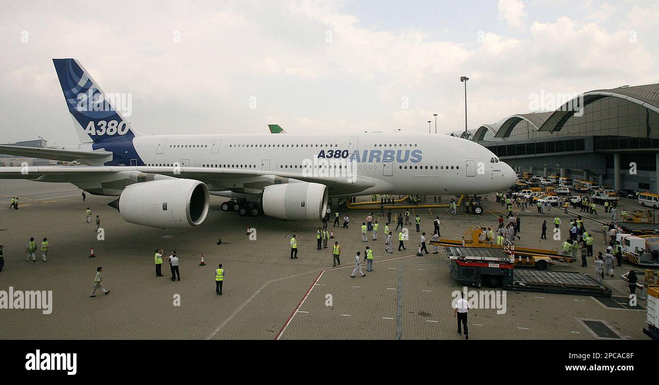 An Airbus A380 jet sits at the terminal at Chek Lap Kok airport ...