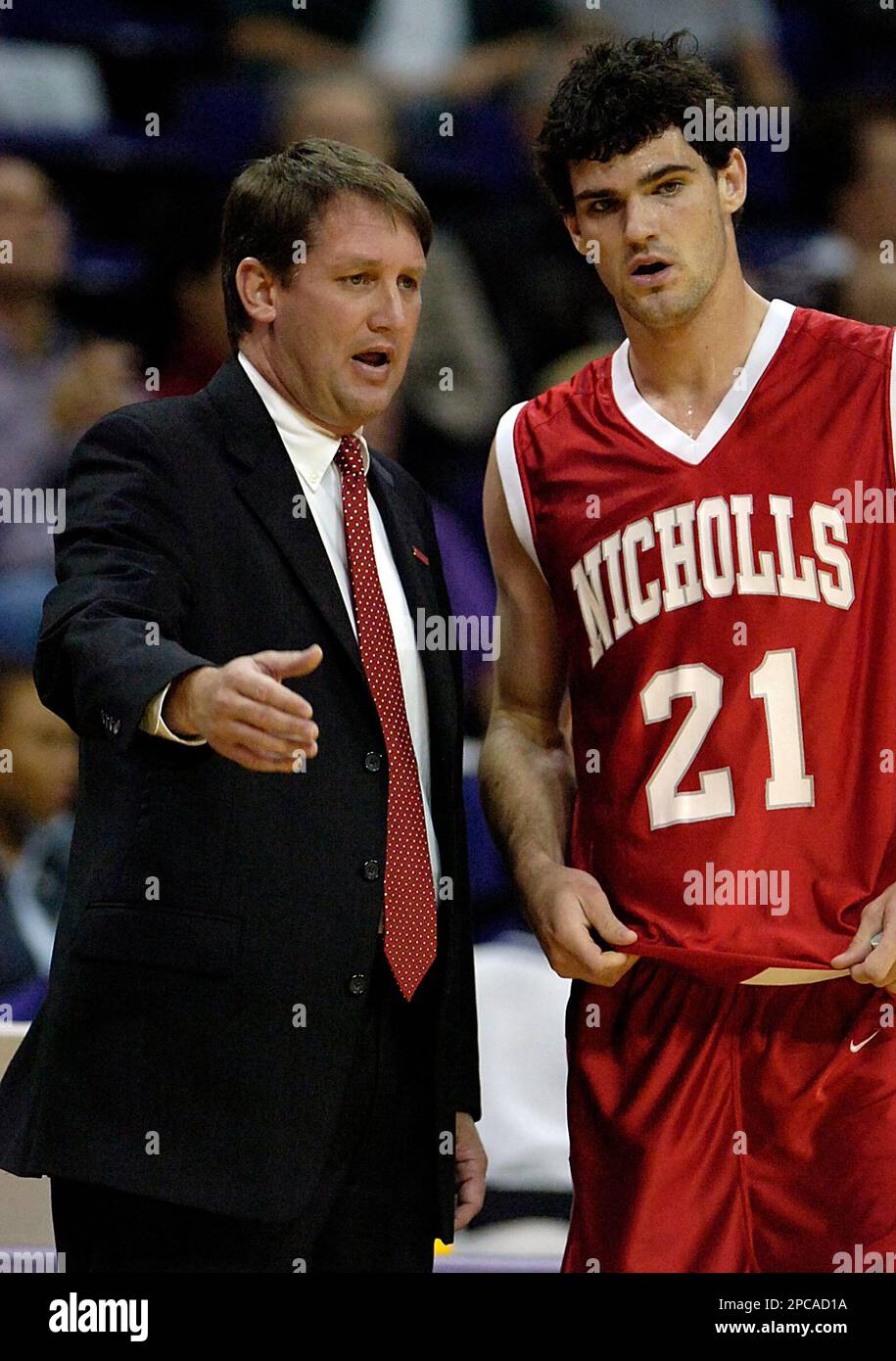 Nicholls State head coach J. P. Piper, left, has a word with Ryan ...