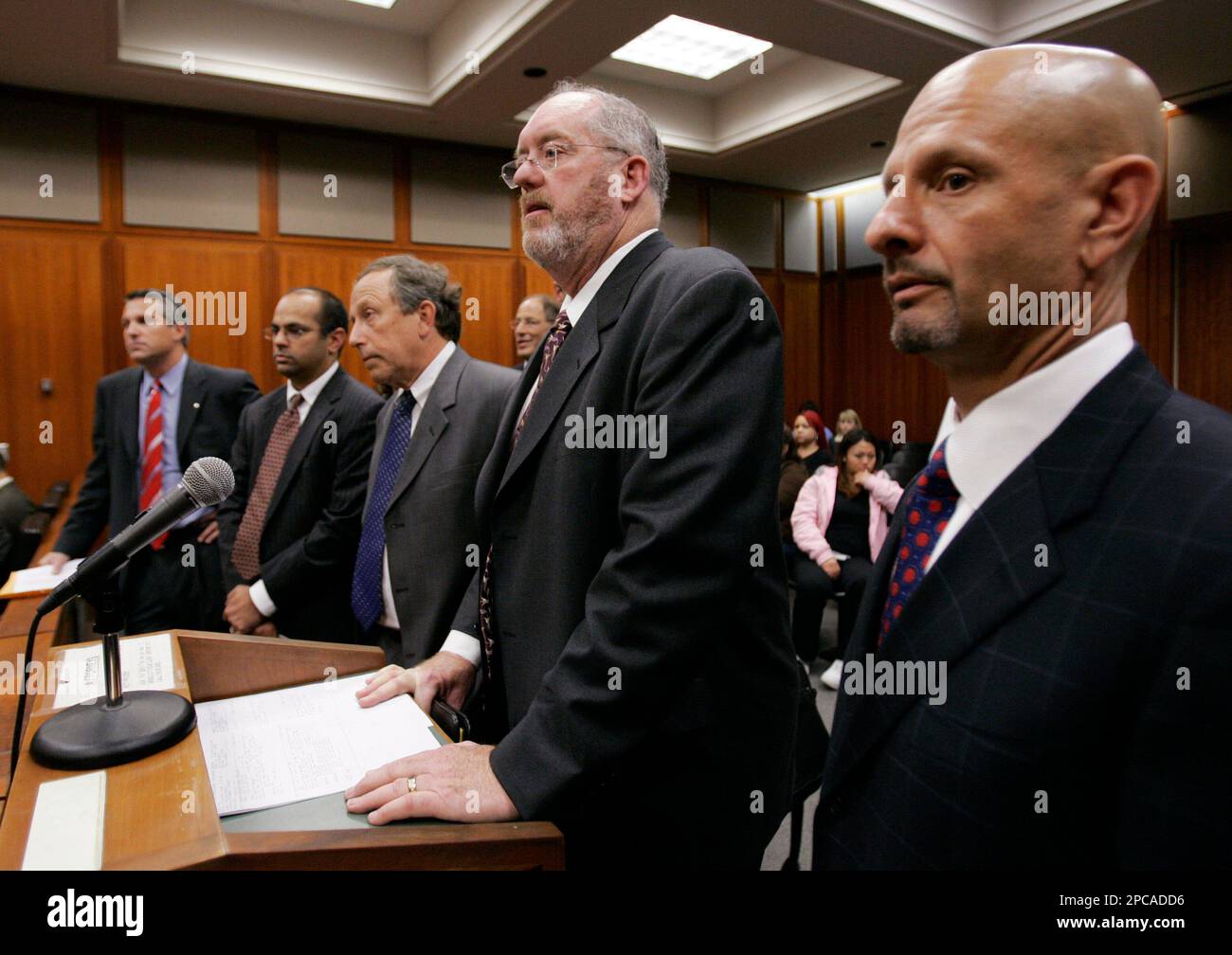 Attorneys Richard Preira, right, Tom Nolan, second from left, Raj ...
