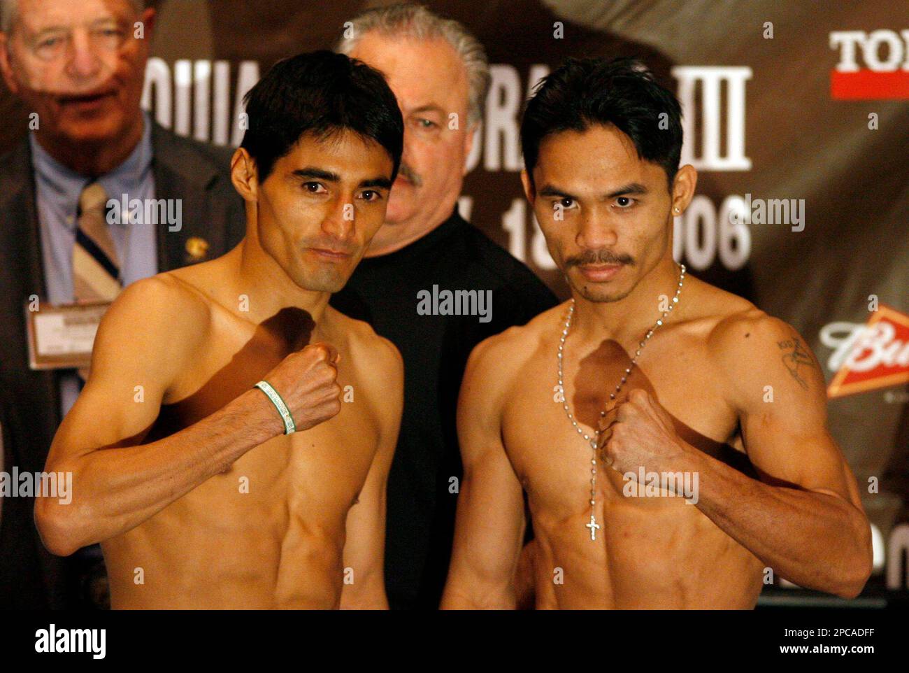 Erik Morales, of Mexico, left, and Manny Pacquiao, of the Philippines ...