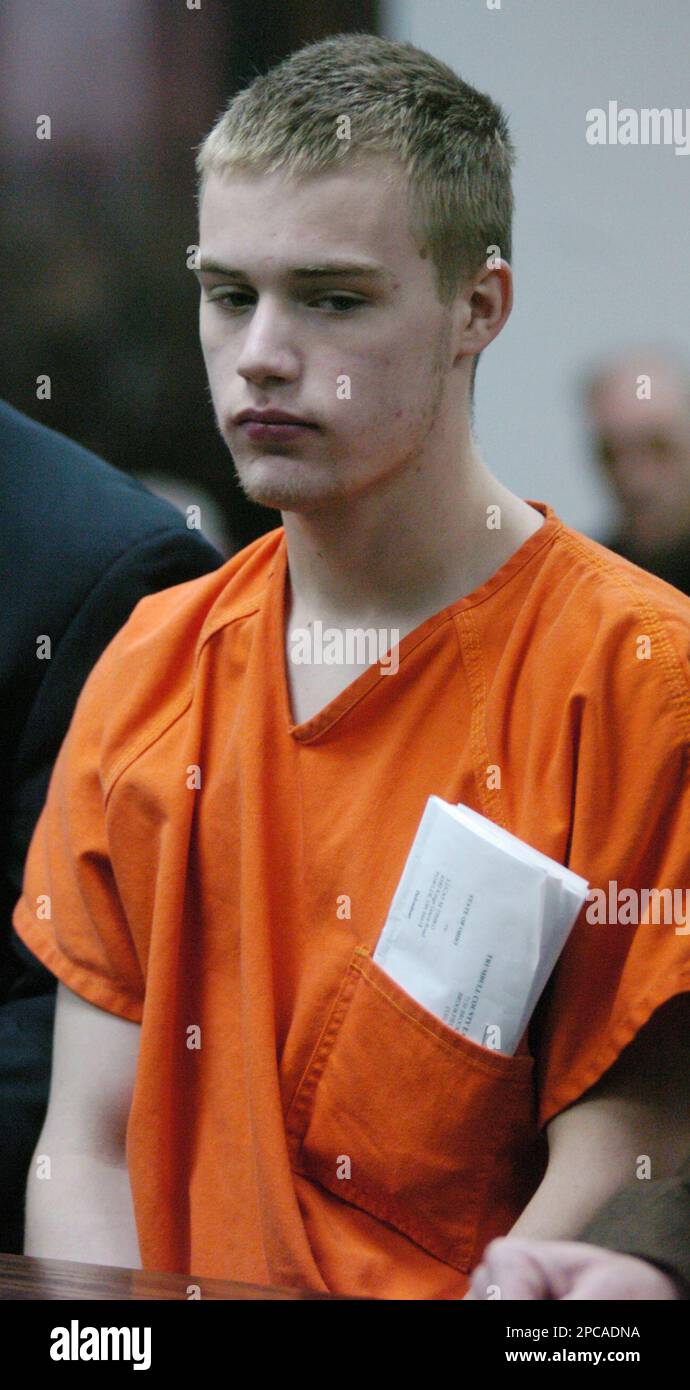 Defendant Lucas Timko listens to statements being read during his ...