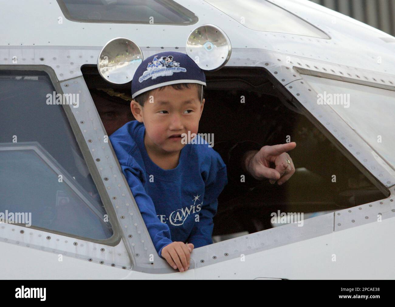 Kaden Graham, 5, of Washougal, Wash., peers out of the cockpit before ...
