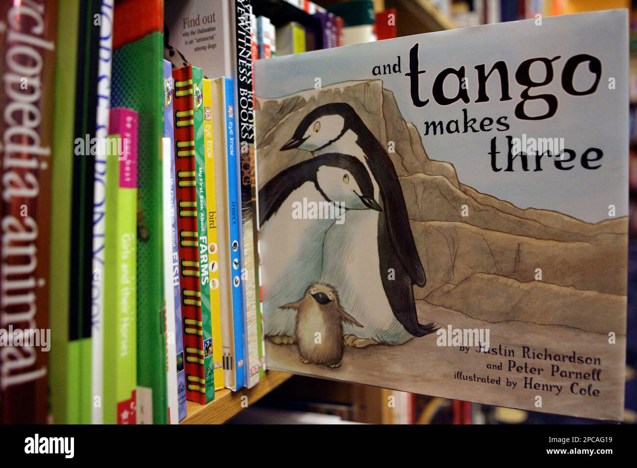 A copy of the book "And Tango Makes Three" is seen on a bookstore shelf ...