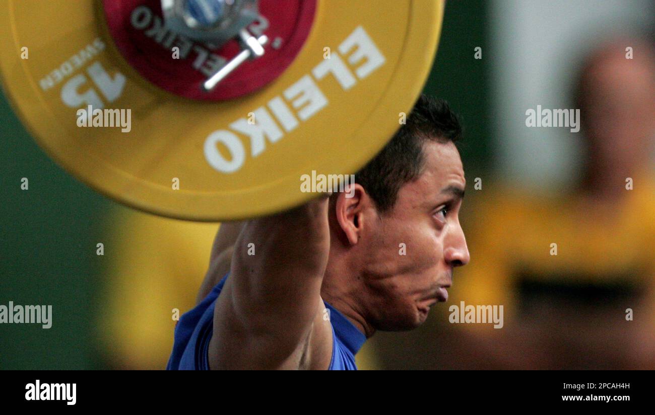 Colombia's Sergio Rada competes to win the gold medal in the 56 kgs ...