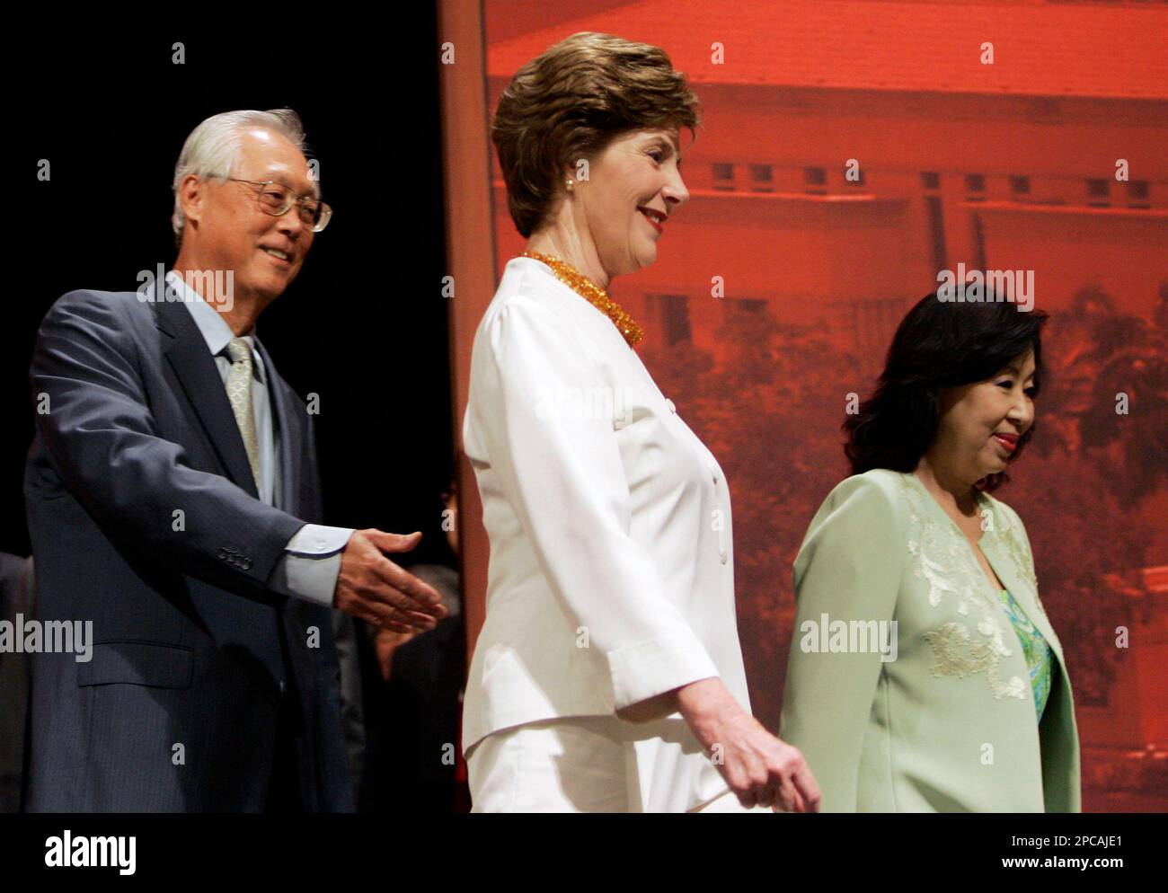U.S. first lady Laura Bush, center, arrives with Singaporean Senior ...