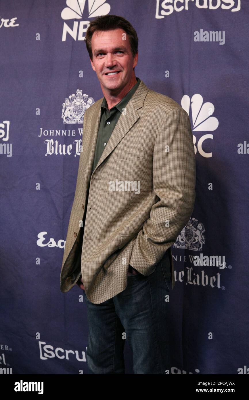 Neil Flynn poses for photographers as he arrives to the Blue Scrubs ...
