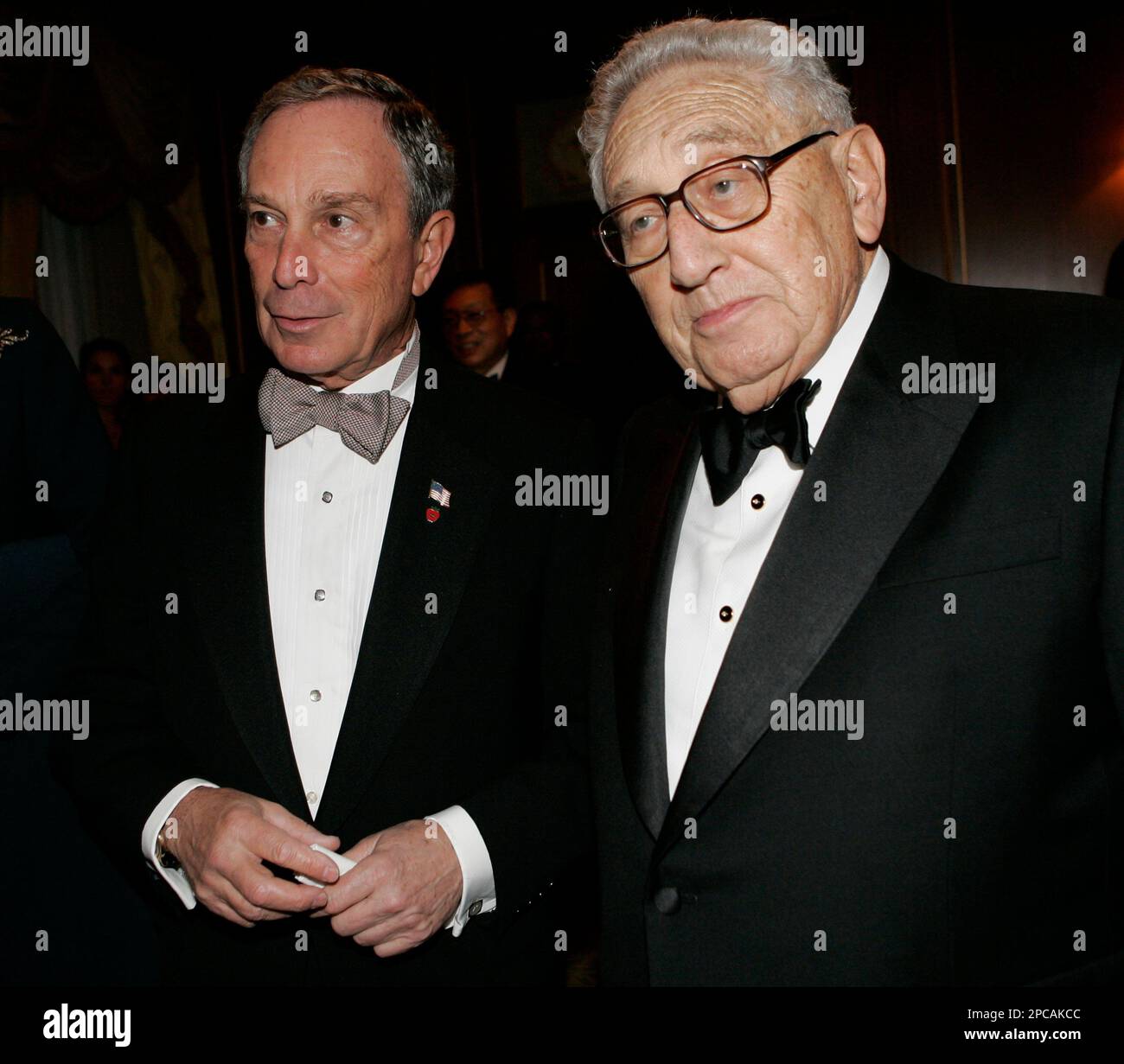New York City mayor Michael Bloomberg, left, and Henry Kissinger arrive ...