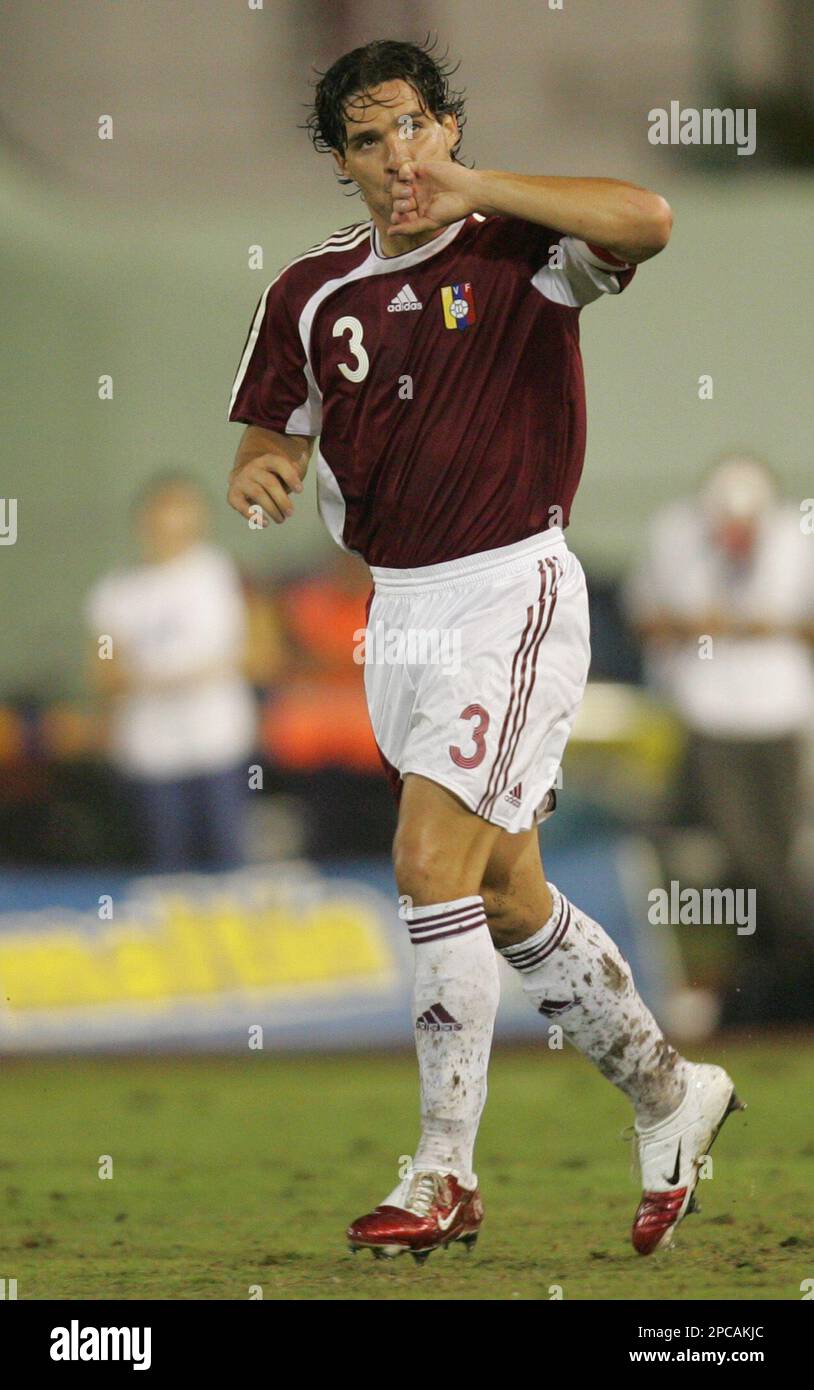 Venezuela's Jose Manuel Rey kisses his hand to celebrate scoring his ...