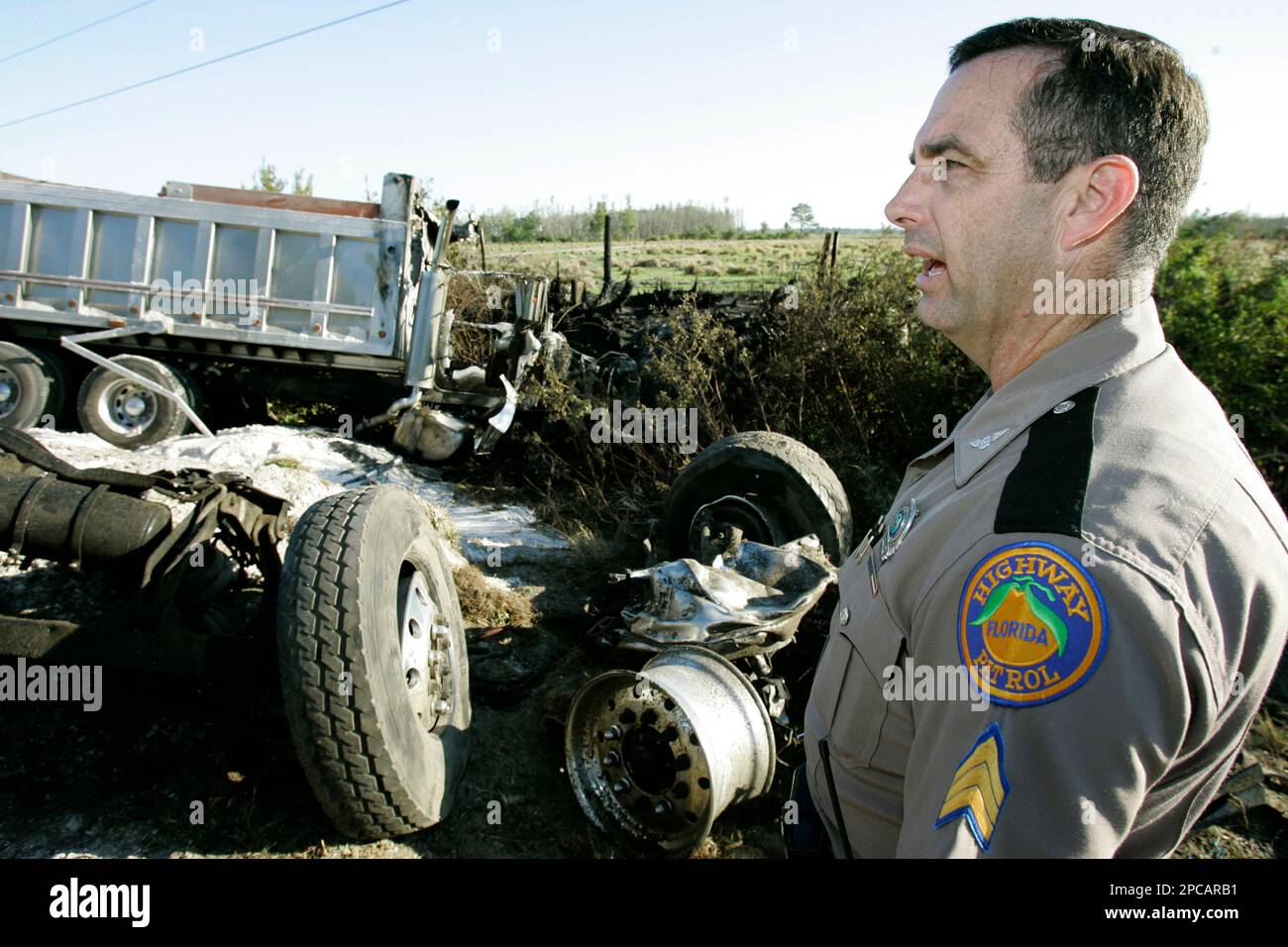 Sgt. Robert Blackwell of the Florida Highway Patrol survey's an ...