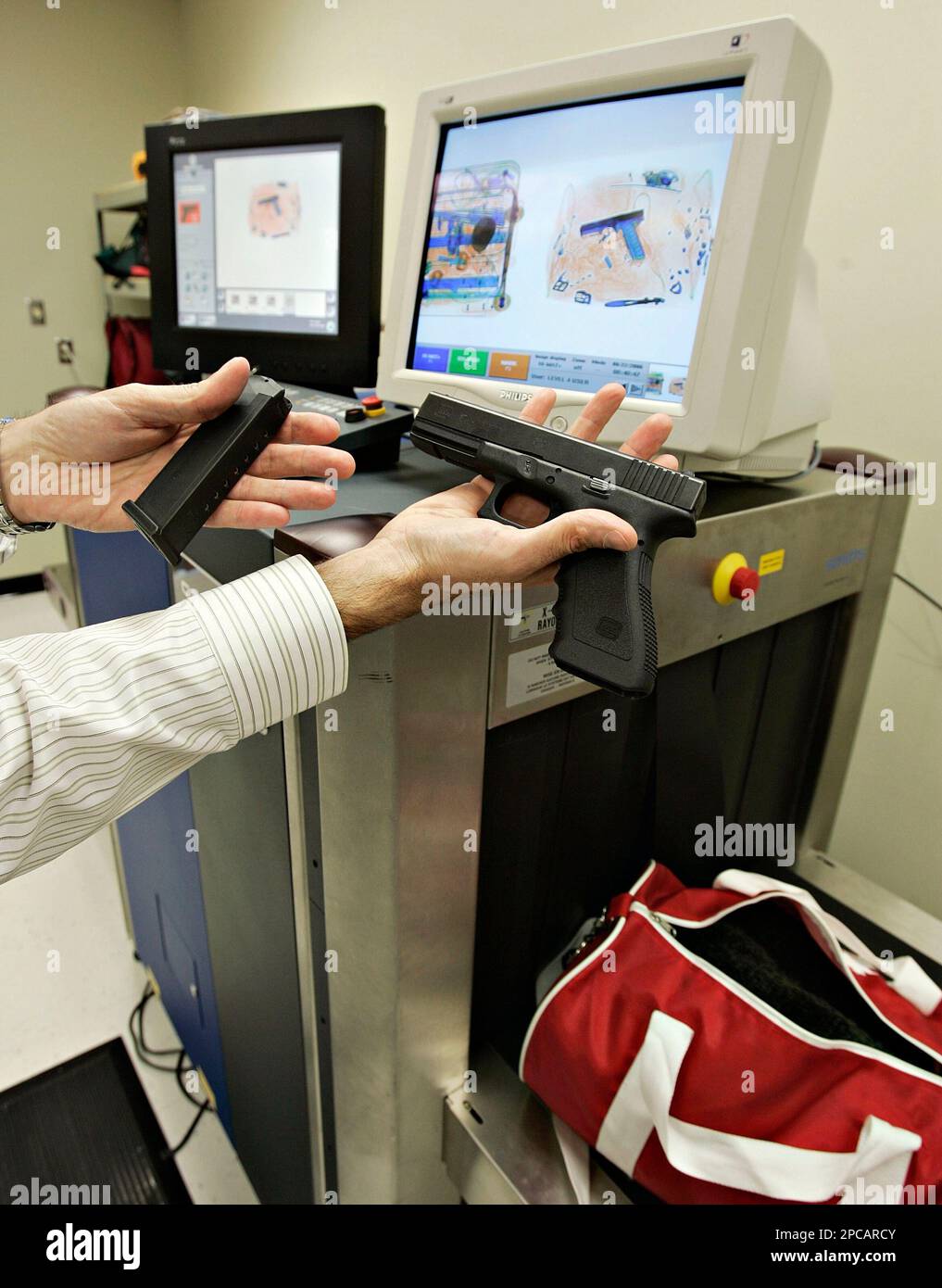 ** EMBARGOED UNTIL 12:01 A.M. EST WEDNESDAY, NOV. 15 ** FILE ** A gun ...