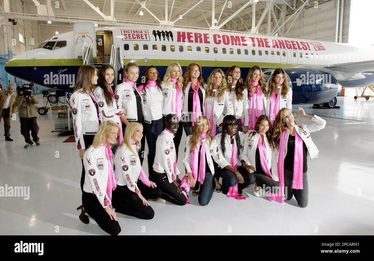 Victoria's Secret models pose in New Windsor, N.Y. ,before boarding a ...