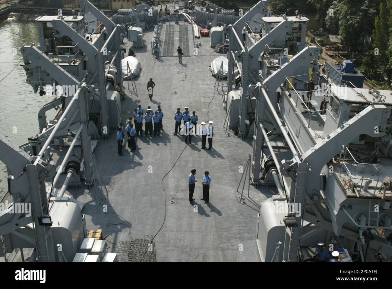 Indian Navy officers get briefed on board INS Shardul, an Indian Navy ...