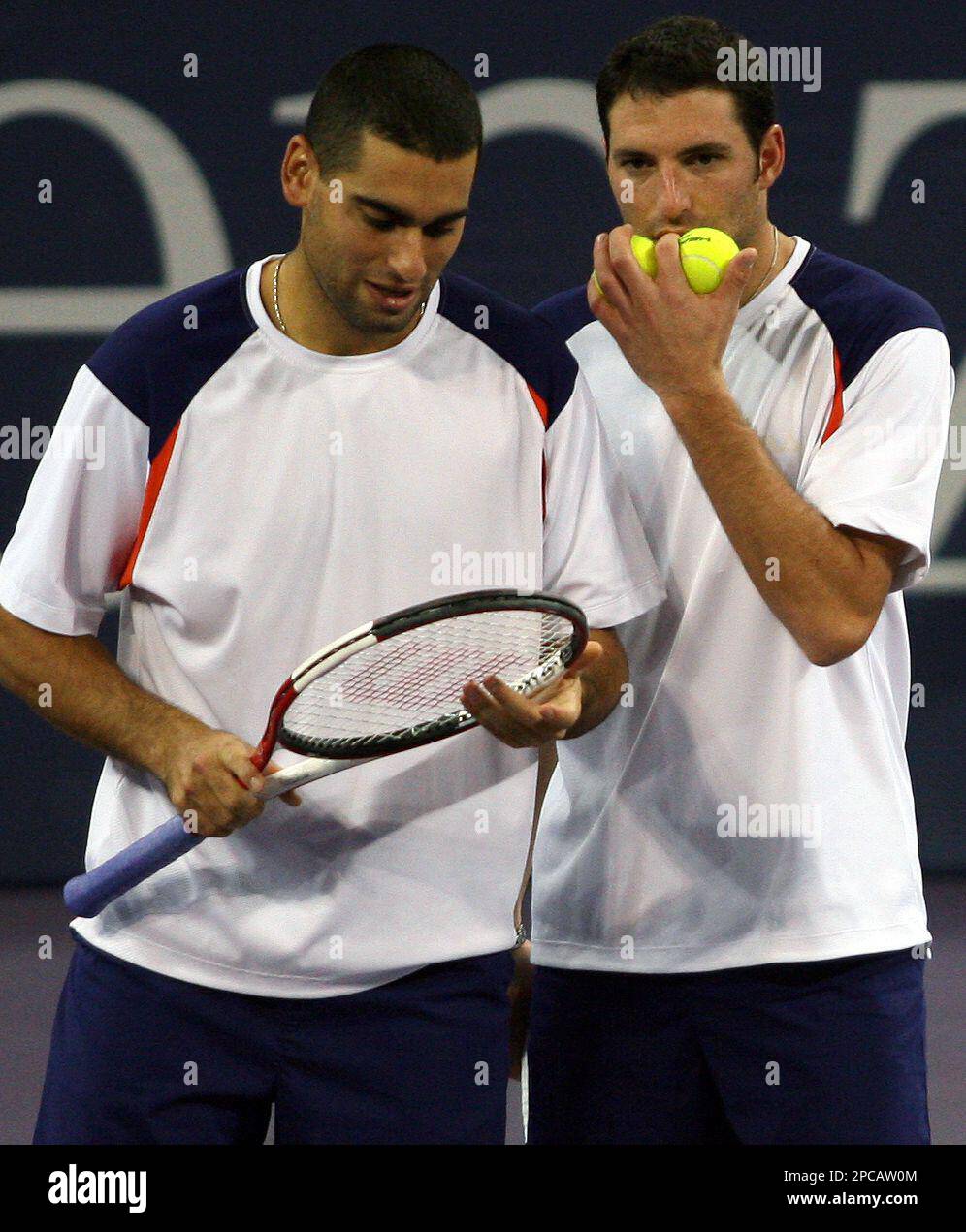 Israel's Andy Ram, right, with partner Johnathan Erlich discuss a play ...