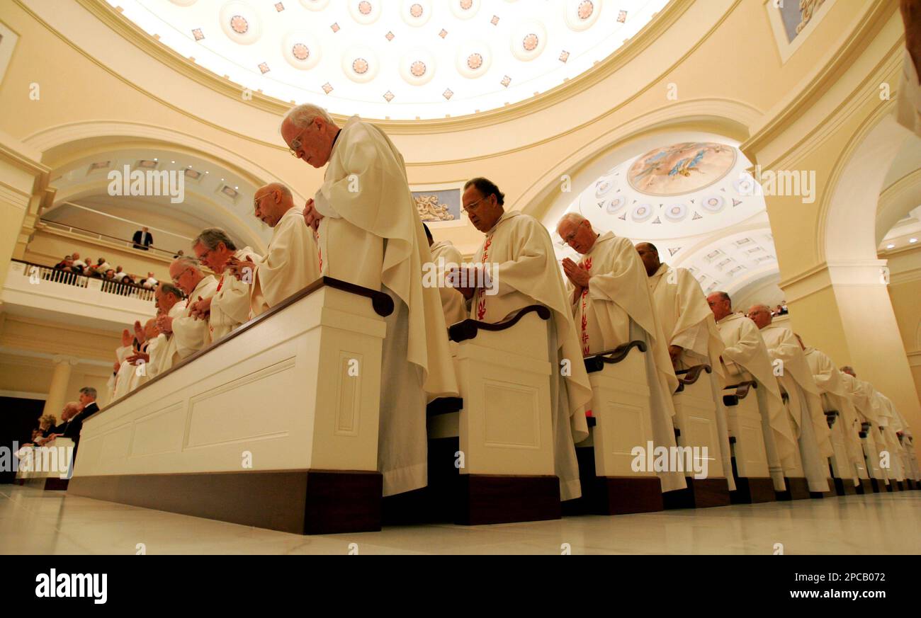 Bishops pray during the Bishops' Mass at the Baltimore Basilica on ...