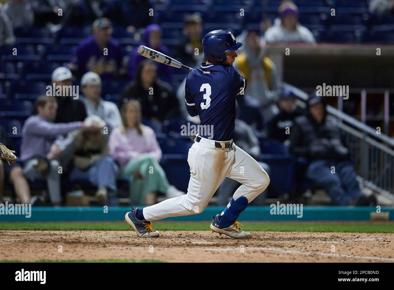 Riley Cheek (3) of the Queens Royals at bat against the East Carolina ...