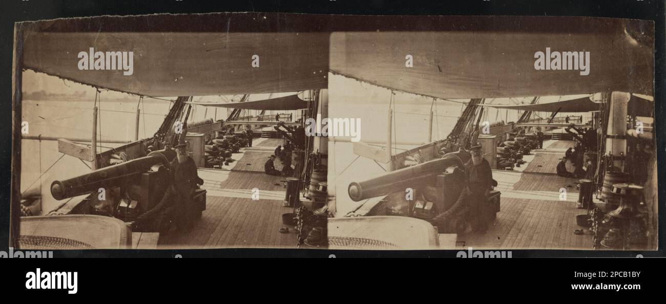 Deck of the USS Pawnee showing a sailor with a 100-pounder Parrott ...