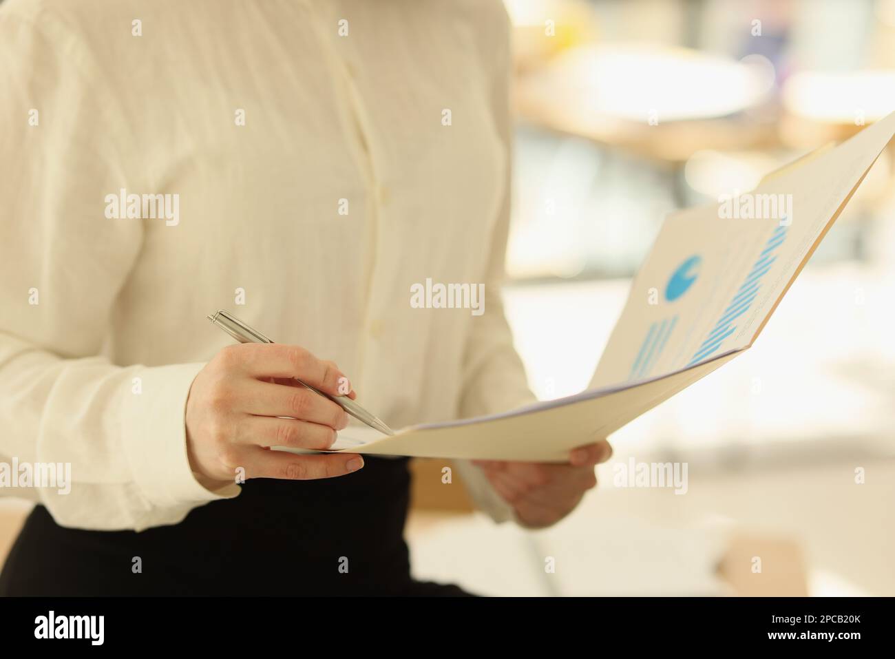 Woman smile financial paper hi-res stock photography and images - Alamy
