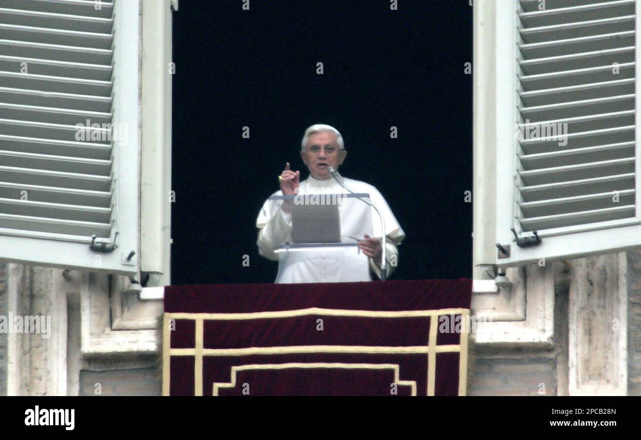 Pope Benedict XVI delivers his Angelus prayer from his window ...