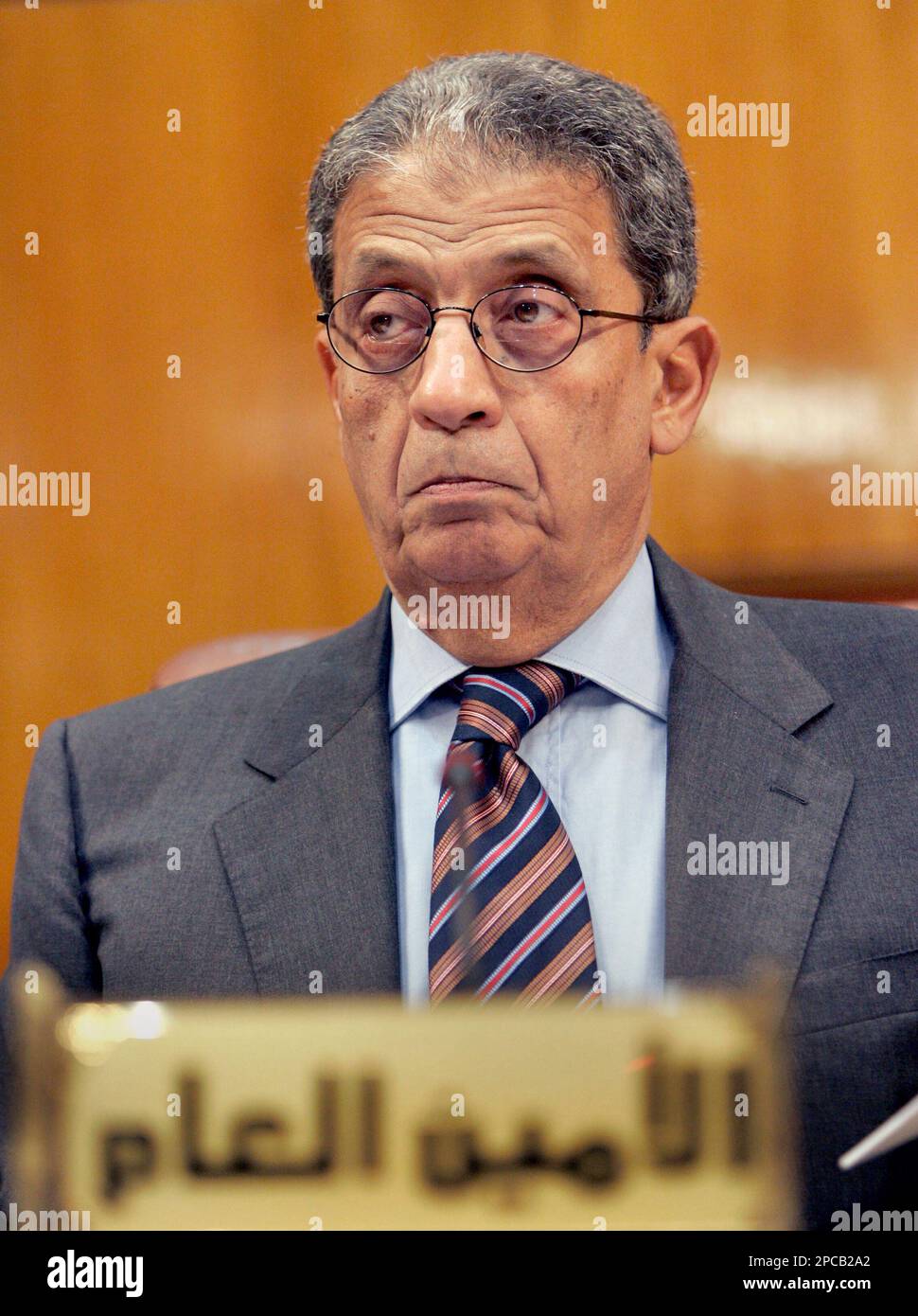 Arab League Secretary-General Amr Moussa attends an emergency meeting ...