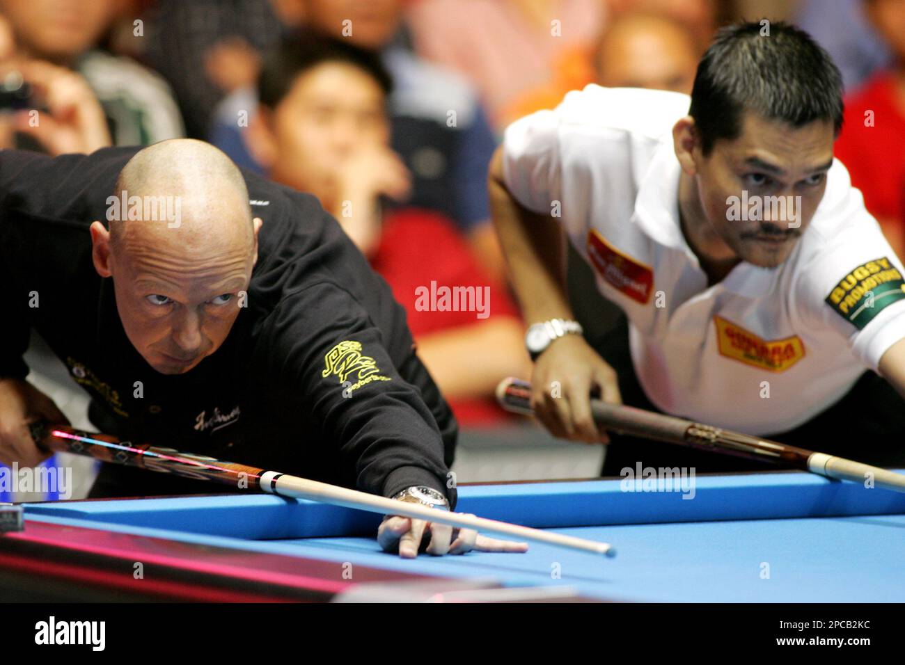 Germany's Ralf Souquet, left, and Philippines' Ronato Alcano vie for ...