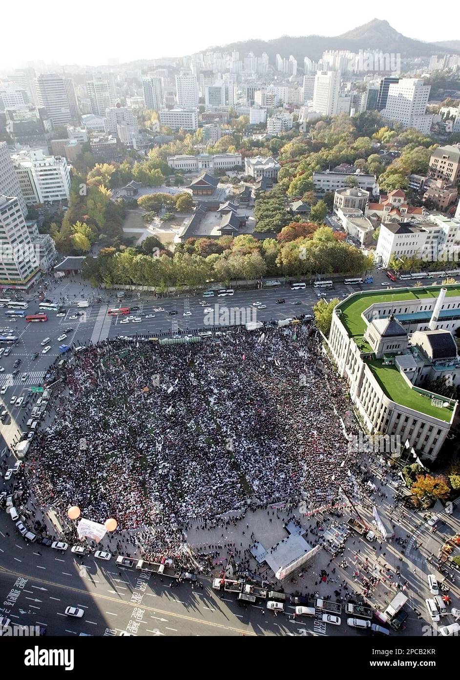 South Korean workers gather in front of Seoul City Hall during a rally ...