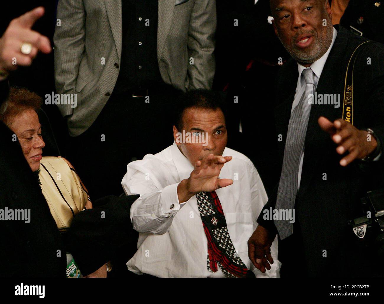 Boxing legend Muhammad Ali, center, reacts to his daughter Laila Ali's ...