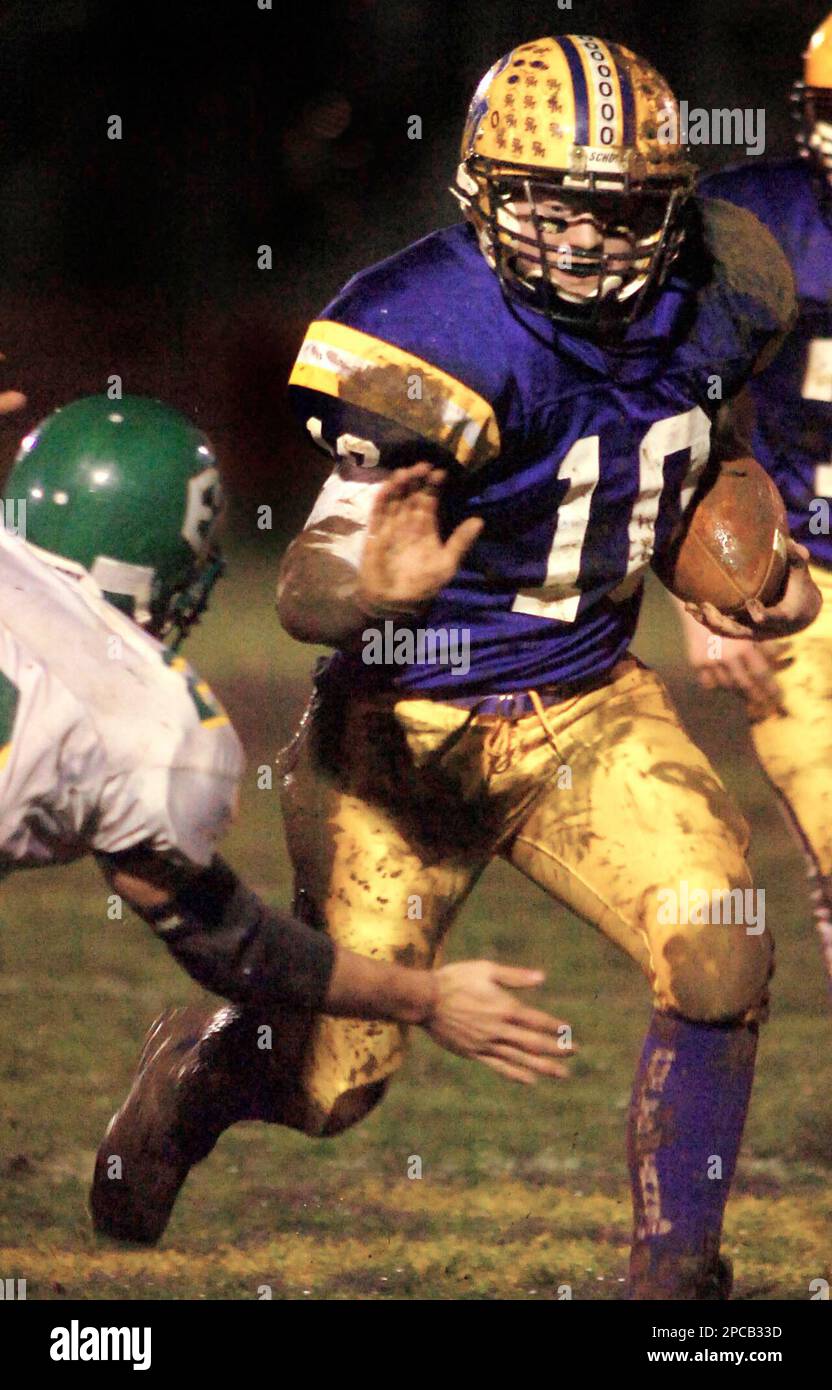St. Marys High School's Logan Bennett gets ready to stiff-arm East ...