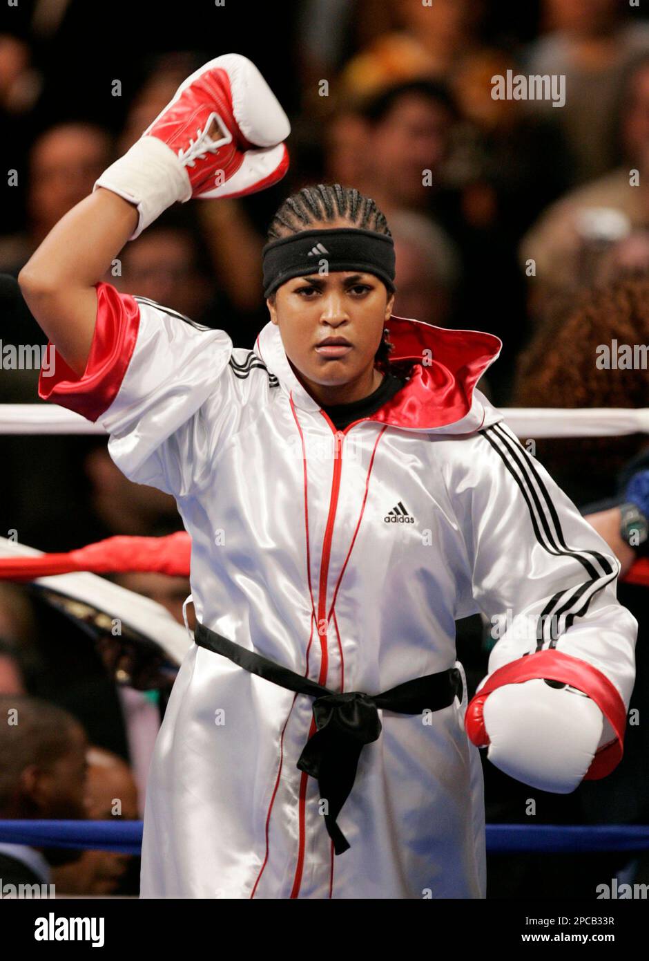 Laila Ali enters the ring for her fight against Shelley Burton at ...