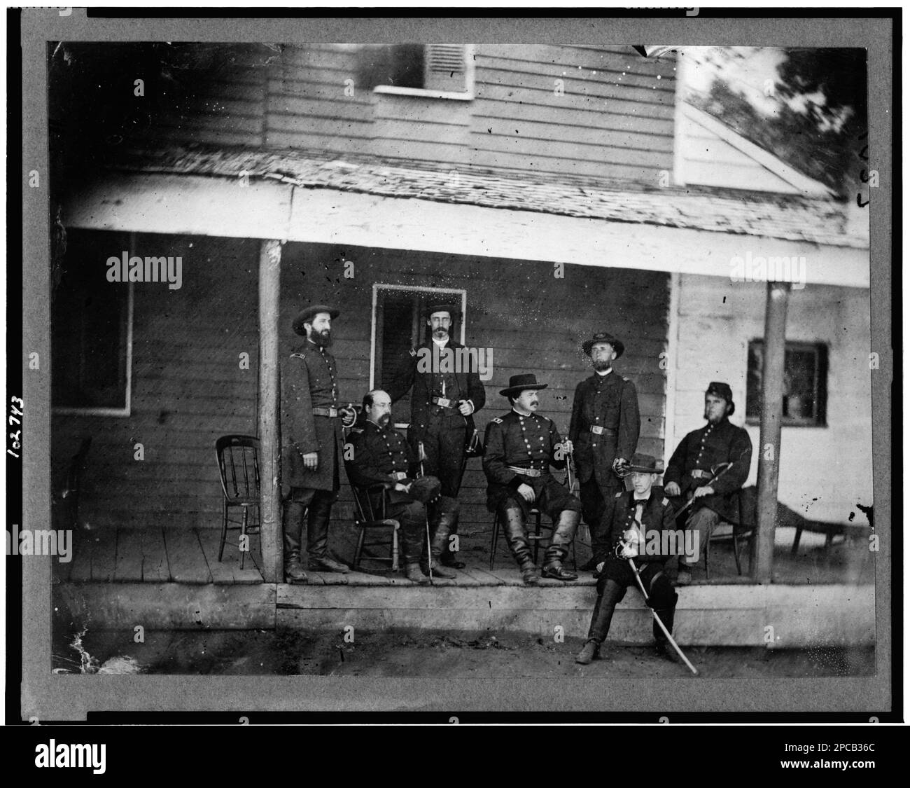 General Alexander McCook and staff posed on porch near Washington, D.C ...