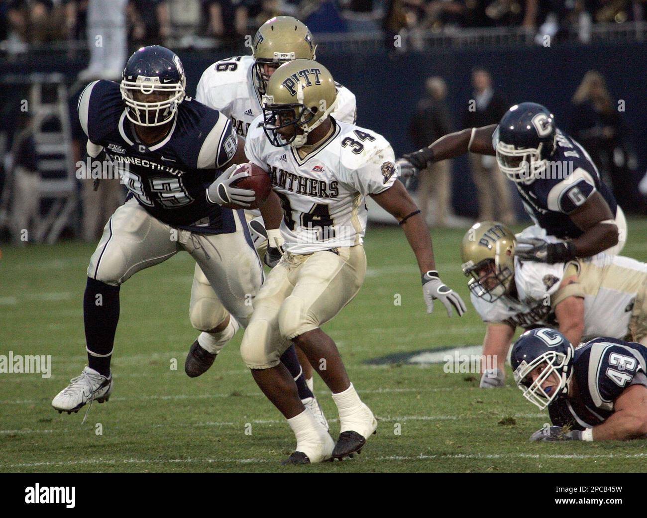 Pittsburgh's LaRod Stephens-Howling runs the ball as Connecticut's ...