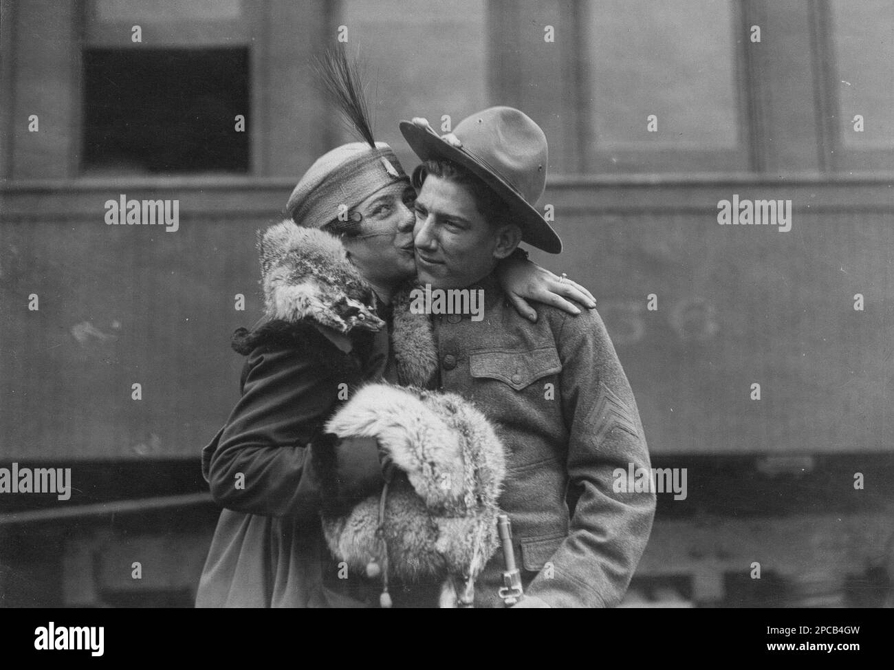 A doughboy gets a kiss at Union Station, in Cleveland, Ohio, a city ...