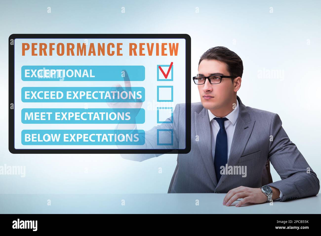 Annual performance review concept with the businessman Stock Photo - Alamy