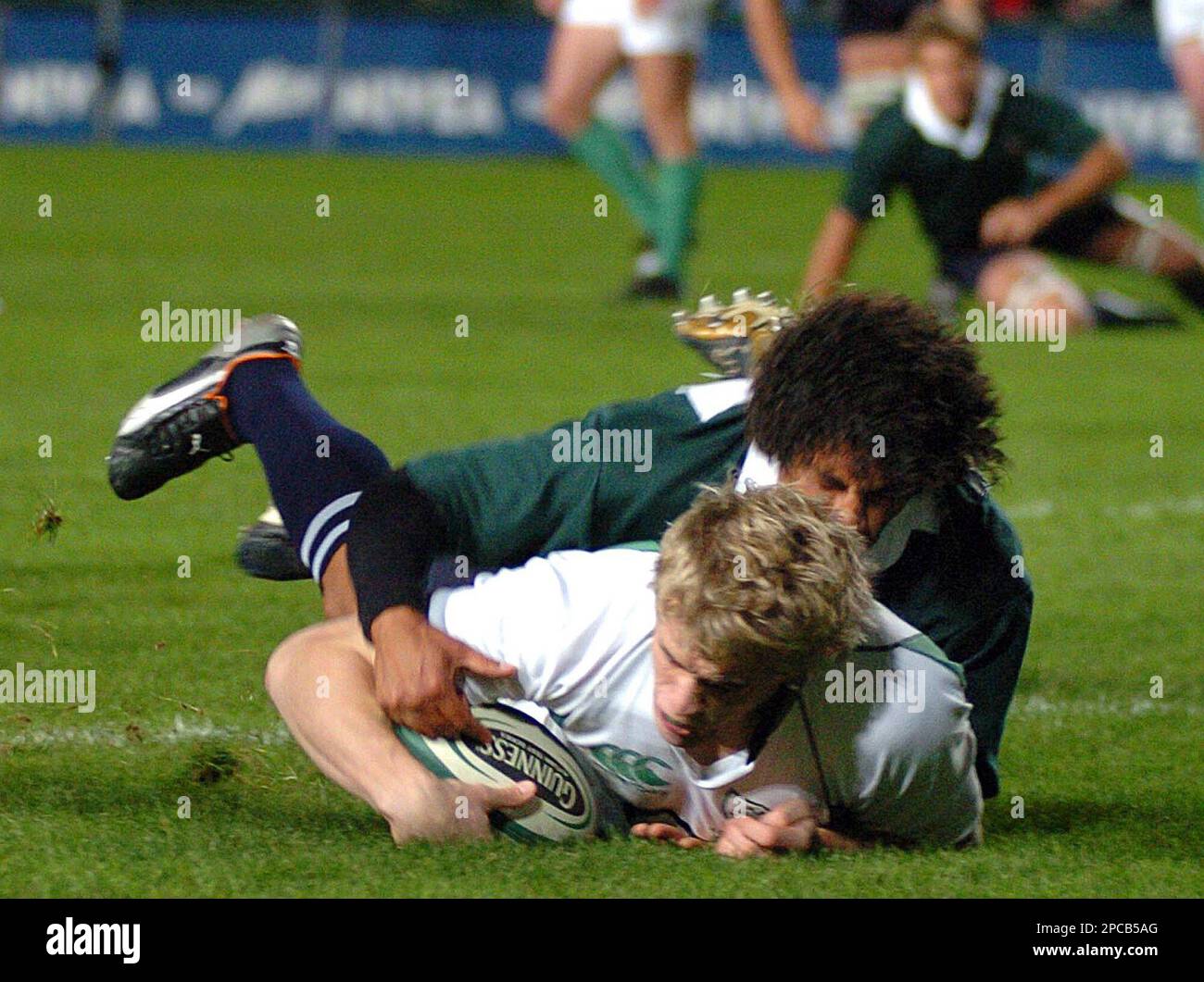 Bevin Fortuin of South Africa fails to stop Andrew Trimble of Ireland ...