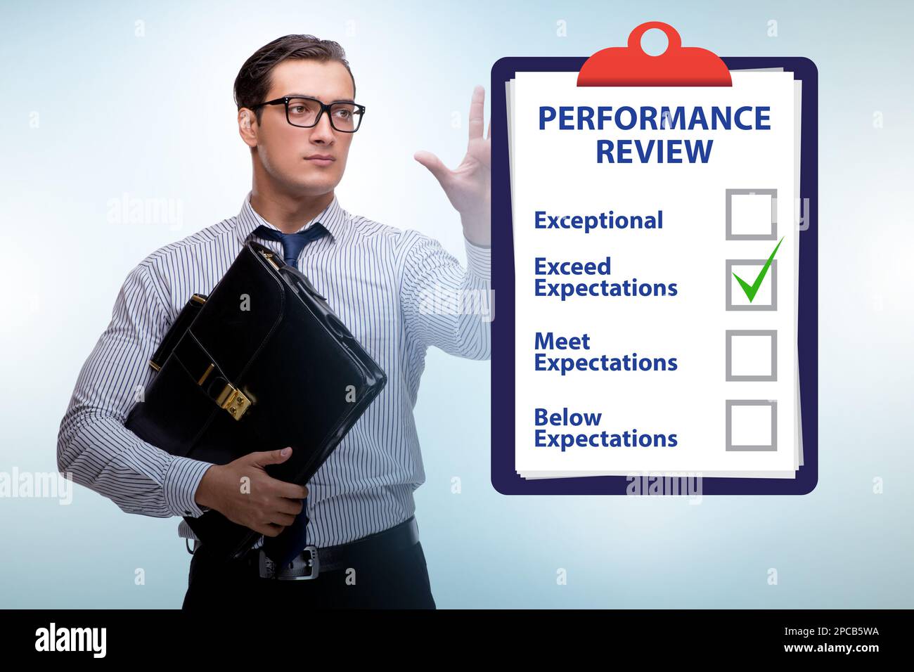 Annual performance review concept with the businessman Stock Photo - Alamy