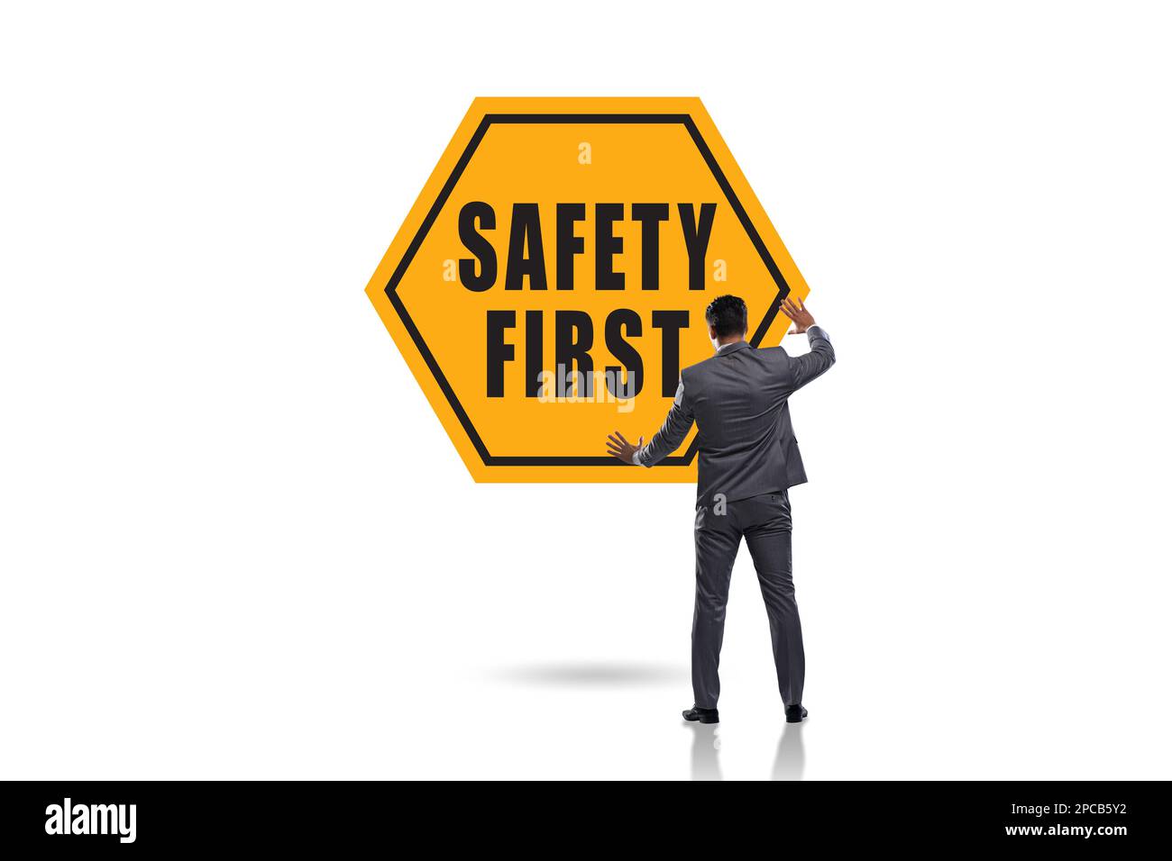 Safety first concept with the businessman Stock Photo - Alamy