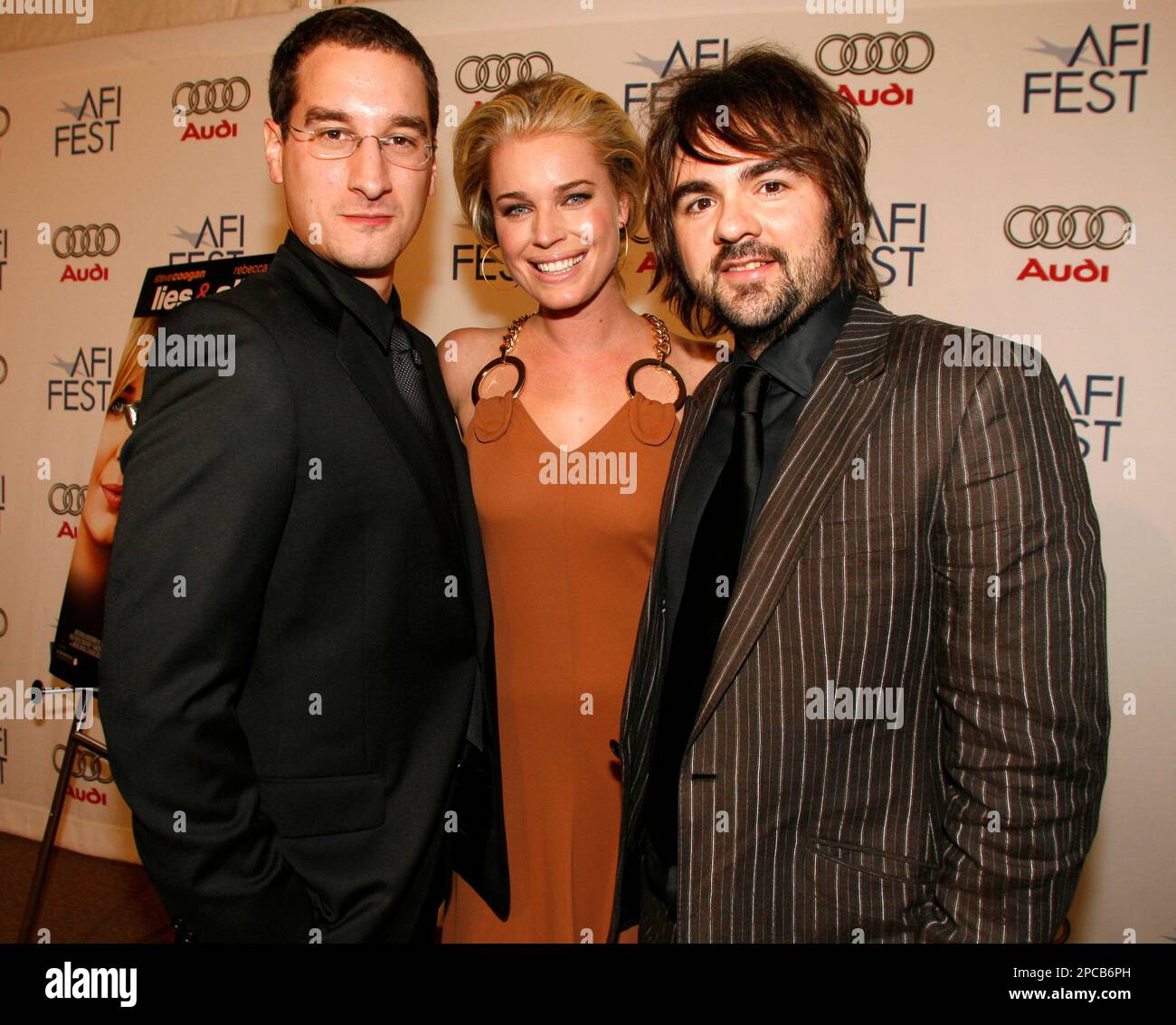 Director Matt Checkowski, left, actress Rebecca Romijn and co-director ...