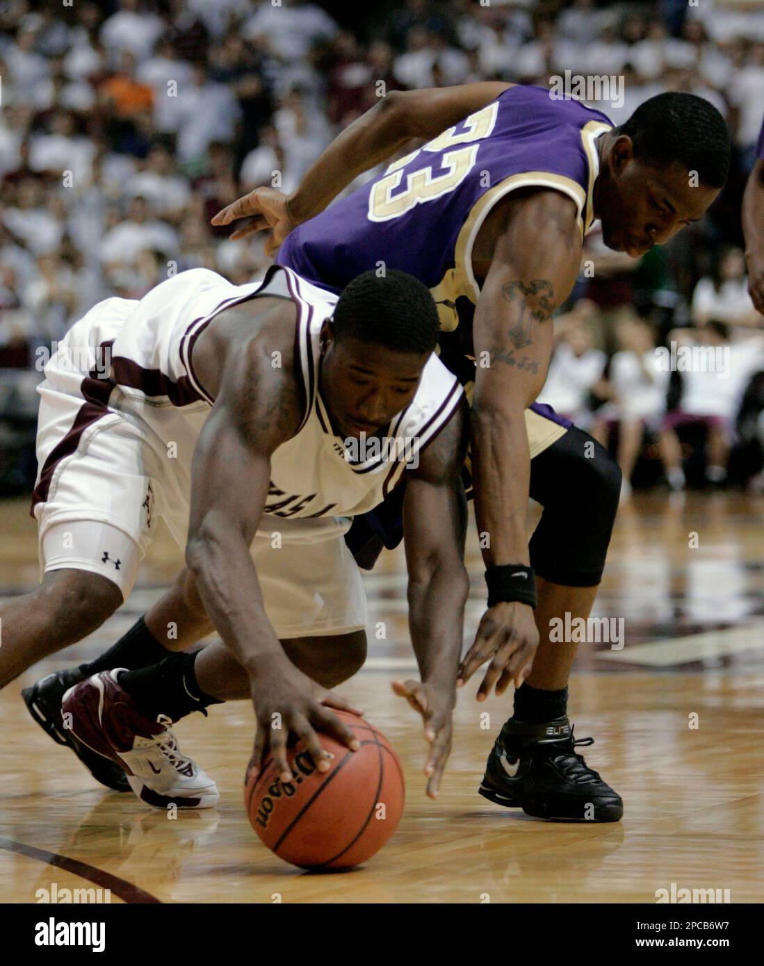 Texas A&M's Donald Sloan, left, and Prairie View A&M's Brian Ezeh ...